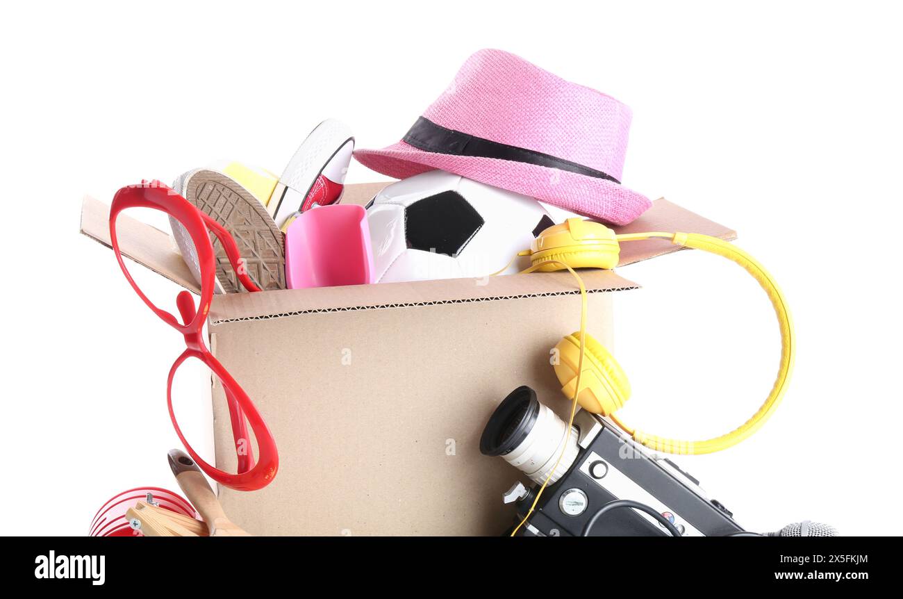 Box of unwanted stuff isolated on white Stock Photo - Alamy