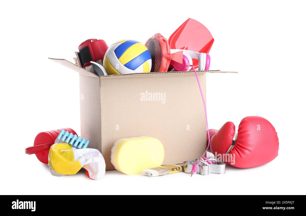 Box of unwanted stuff isolated on white Stock Photo - Alamy