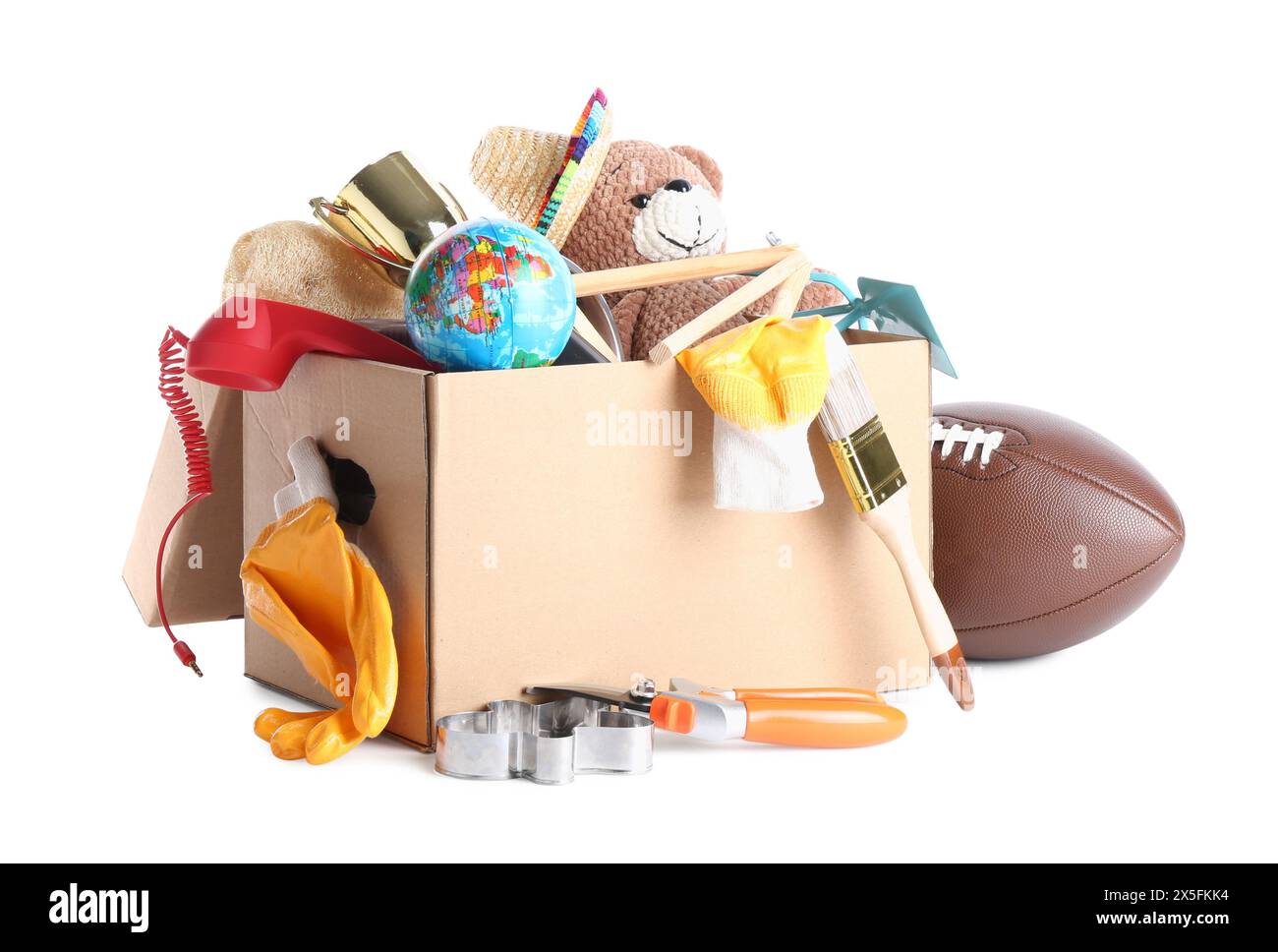 Box of unwanted stuff isolated on white Stock Photo - Alamy