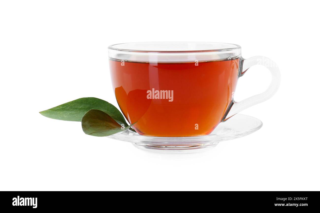 Tasty tea in cup and green leaves isolated on white Stock Photo - Alamy