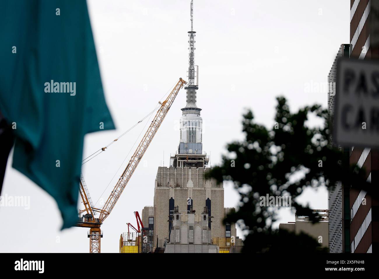 New York, United States. 09th May, 2024. A crane is in use near the ...
