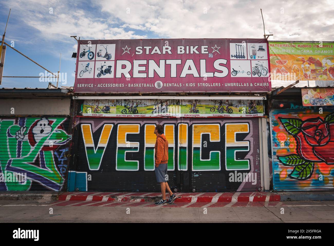 Vibrant Venice Beach Storefront with Graffiti Art and Bike Rentals ...
