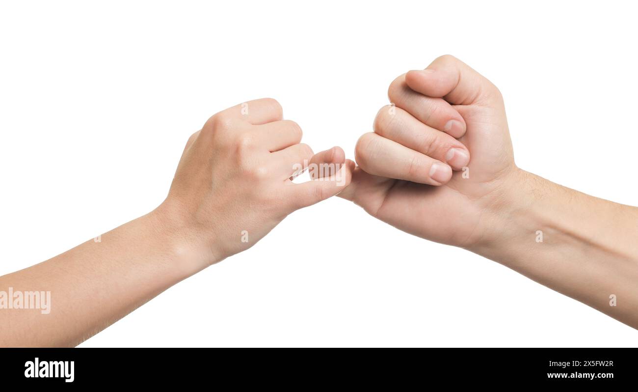 Man and woman holding little fingers together on white background ...