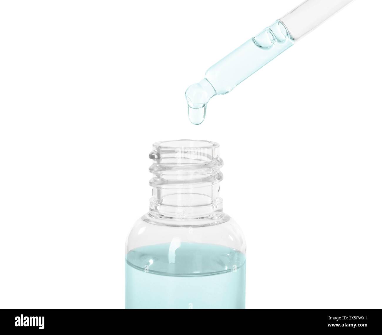 Dripping medical drops into bottle on white background Stock Photo - Alamy