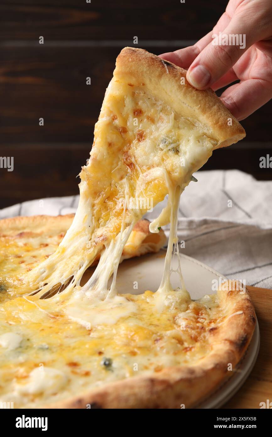 Woman taking piece delicious hi-res stock photography and images - Alamy