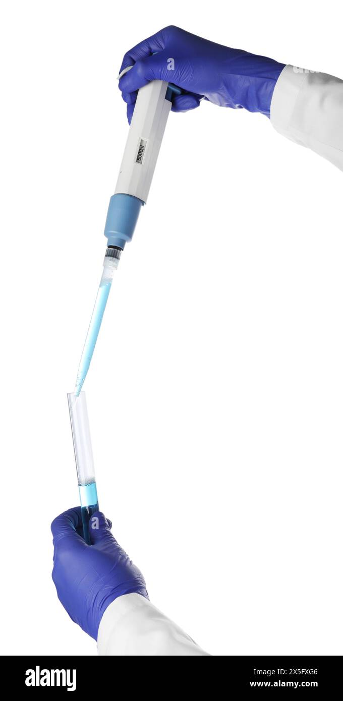 Laboratory analysis. Scientist dripping sample with micropipette into ...