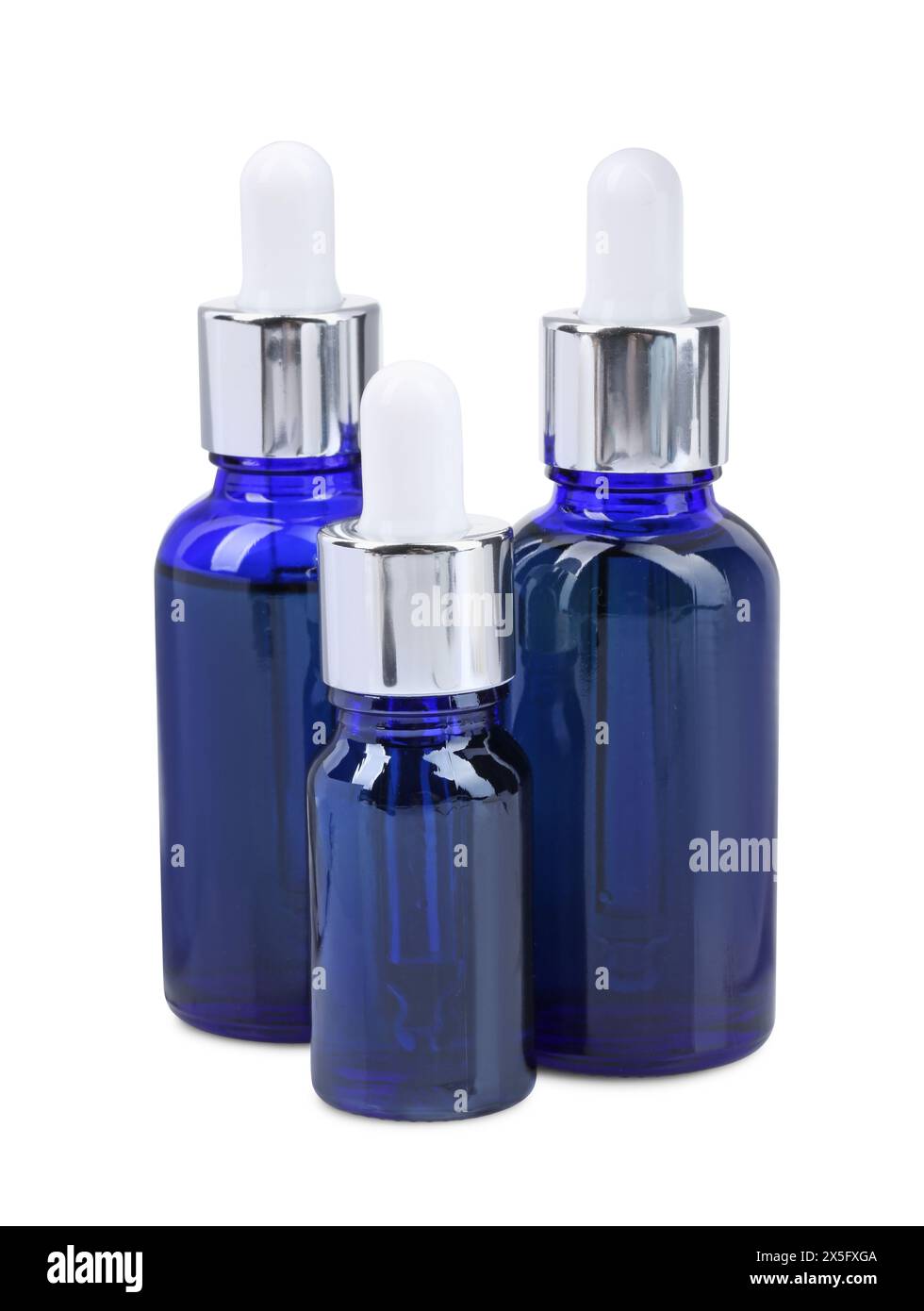 Blue bottles with tincture isolated on white Stock Photo - Alamy