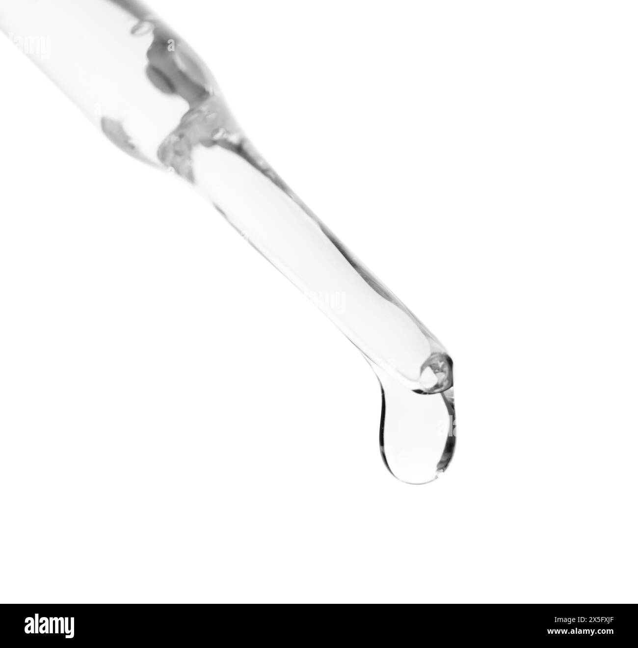 Dripping liquid from pipette isolated on white, closeup Stock Photo - Alamy