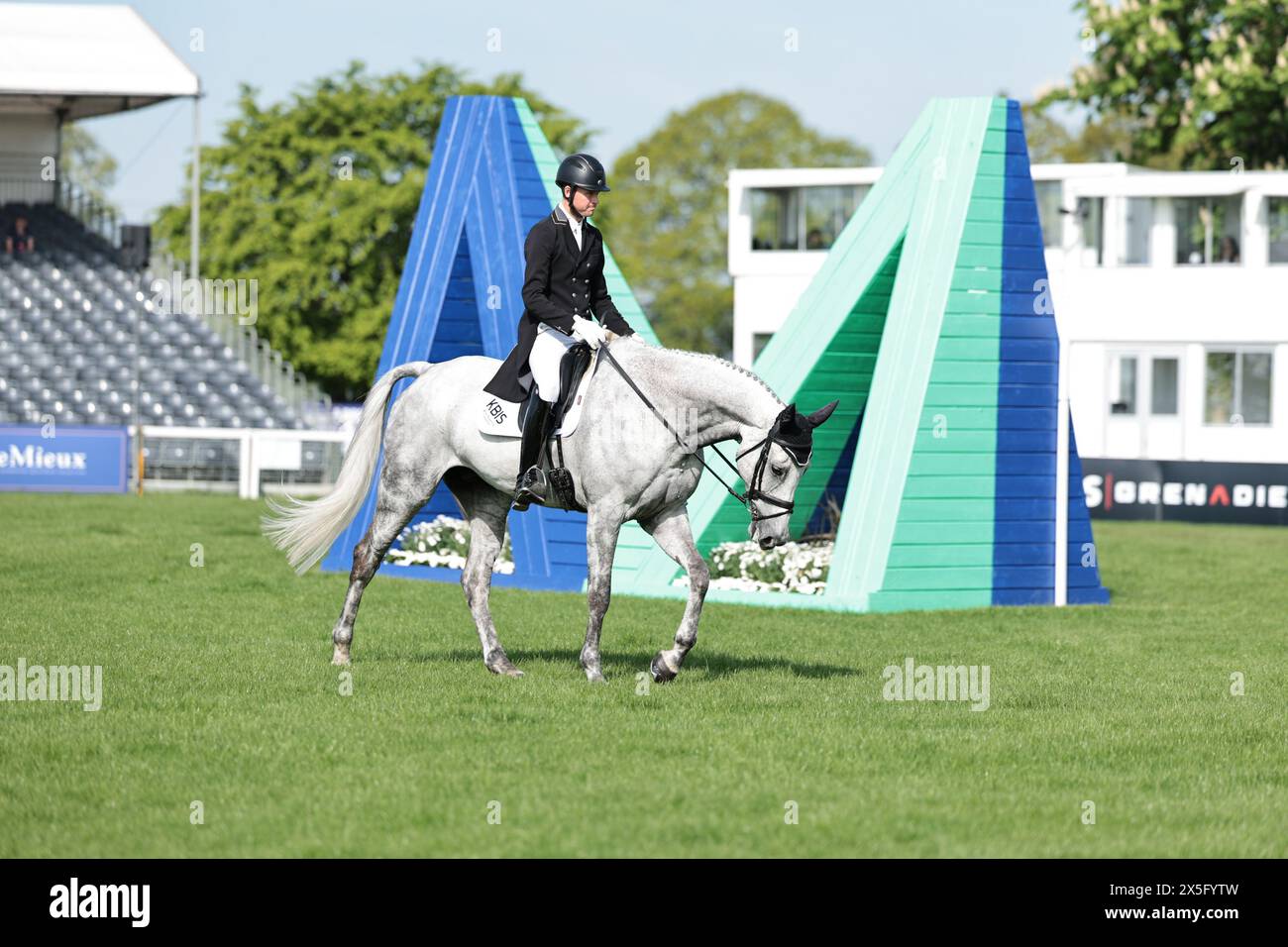 Tom Rowland of Great Britain with Dreamliner during the dressage test ...