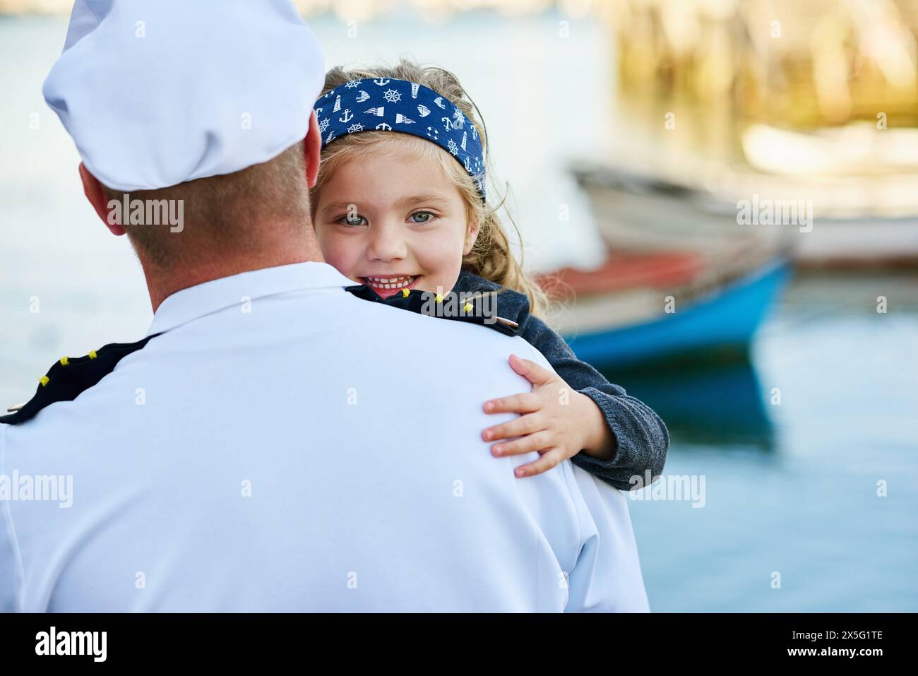 Father, child and marine uniform with hug or sailor captain at ocean ...
