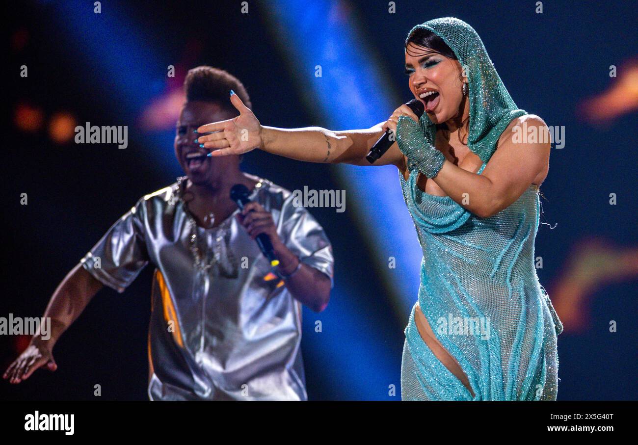 09 May 2024, Sweden, Malmö: Besa Kokëdhima (r) from Albania performs ...