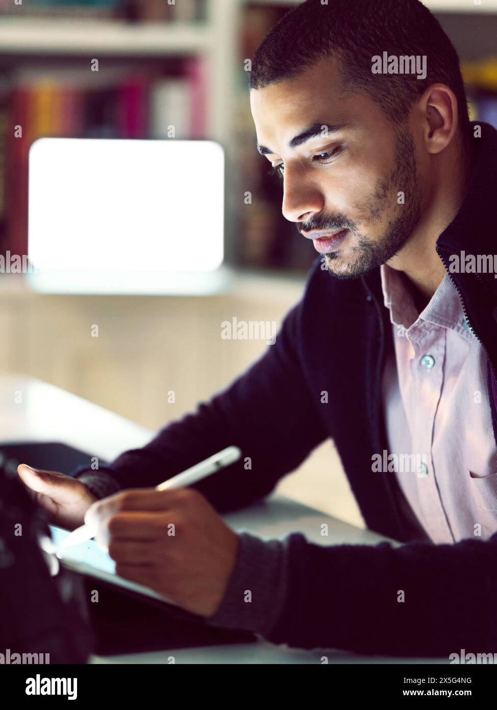 Creative man, drawing and tablet in office for work as graphic designer ...