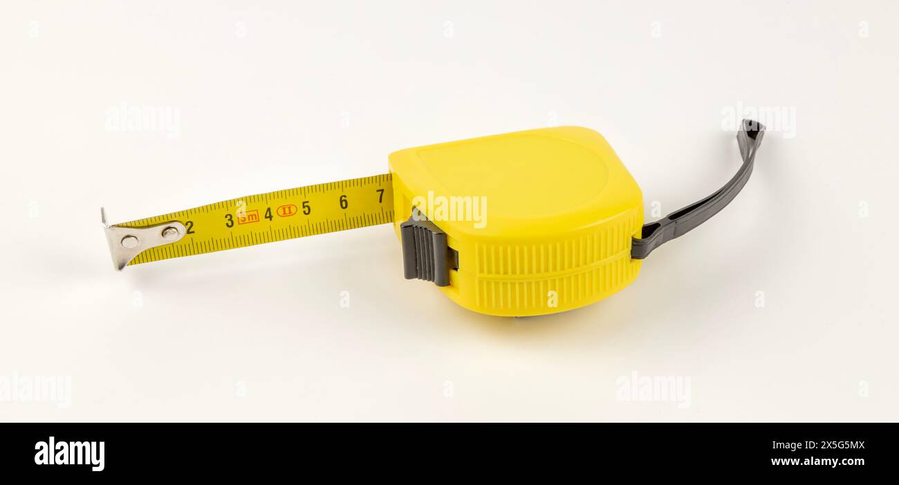 Yellow tape measure. The concept of measuring lengths Stock Photo - Alamy