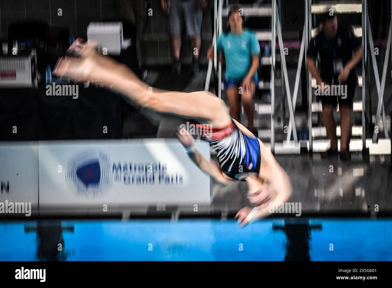 A swimmer competes during the International Diving Championship 2024 at ...