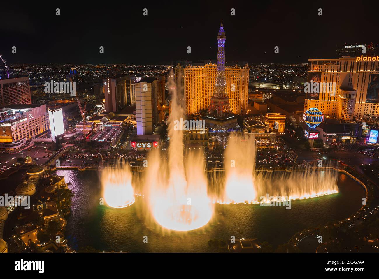 Vibrant Night Scene Las Vegas Strip Fountain Show and Eiffel Tower Replica Stock Photo - Alamy