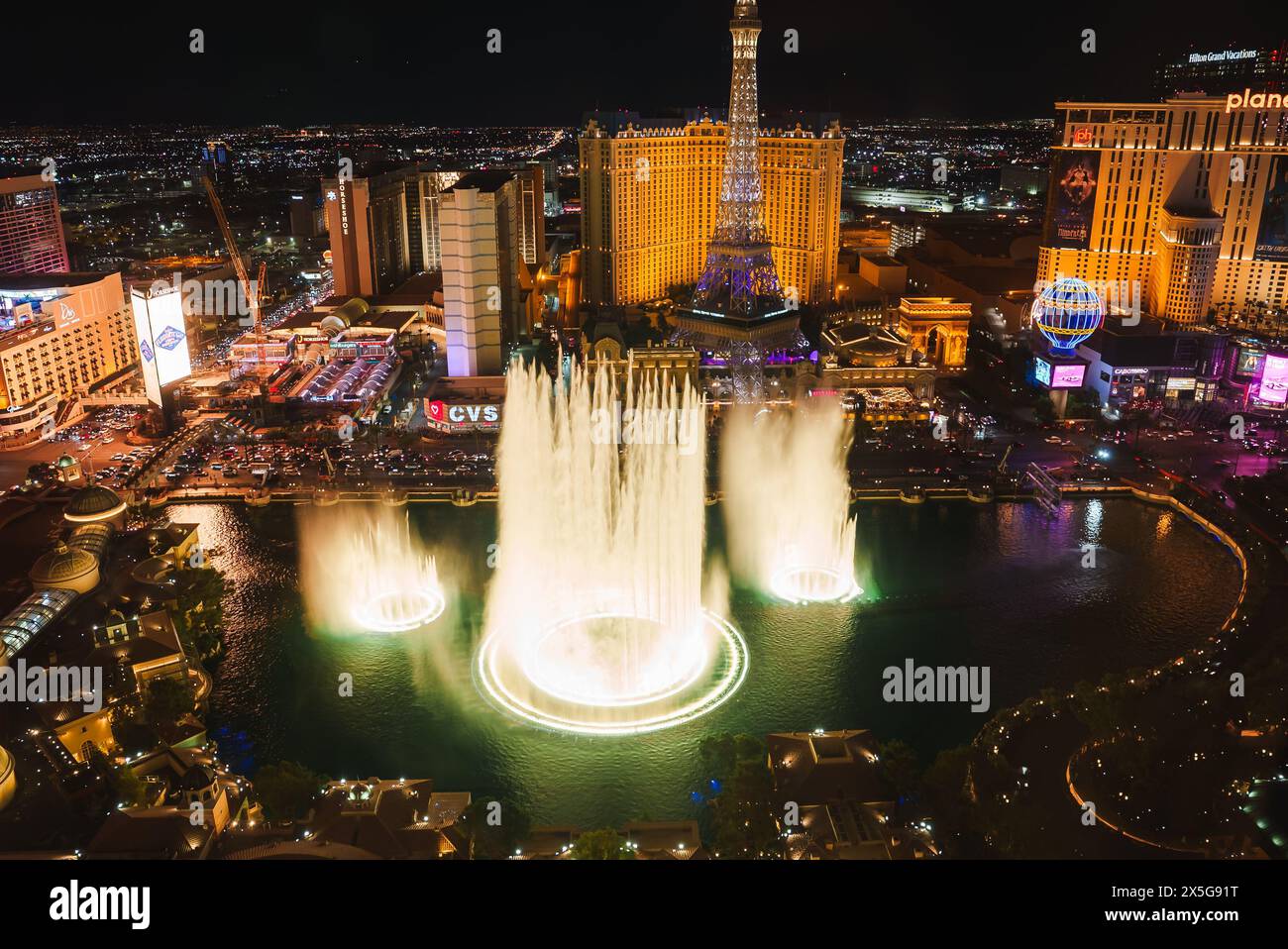 Vibrant Las Vegas Strip Night Scene with Fountain Show Stock Photo - Alamy