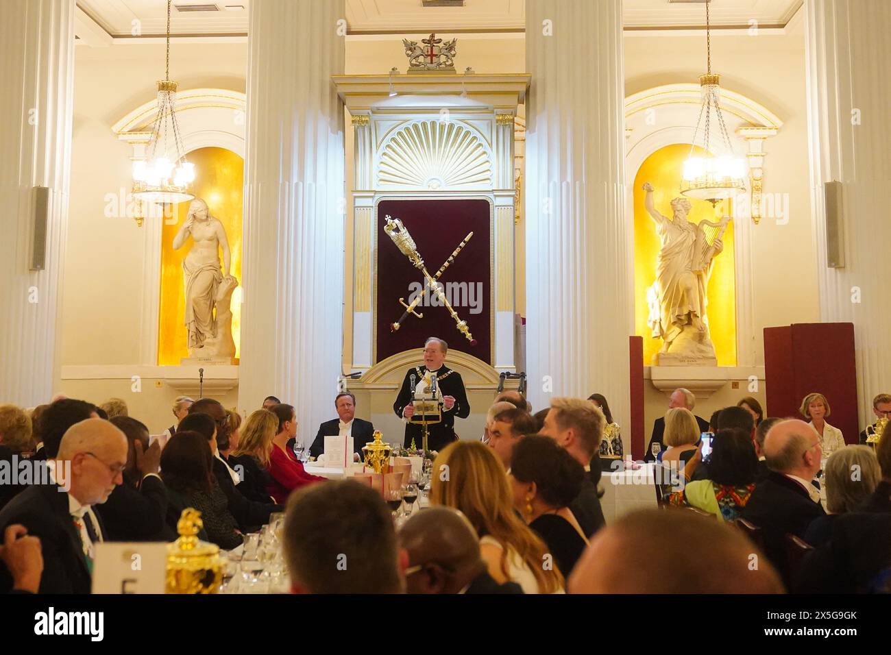 Foreign Secretary Lord David Cameron (left) listens to the Lord Mayor ...