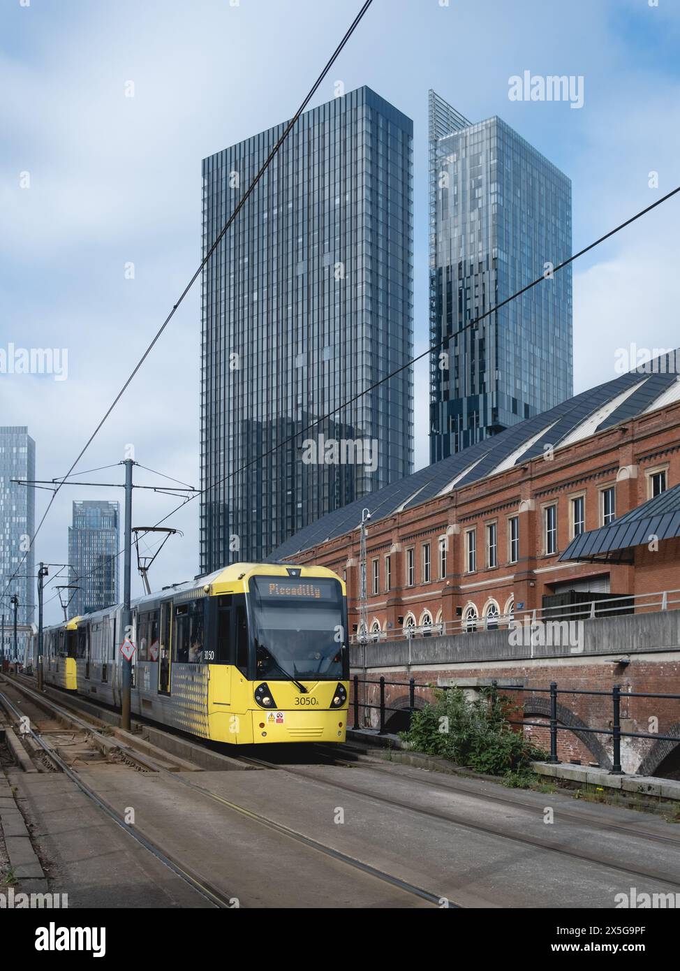 A Bee Network tram in Manchester travelling to Piccadilly. Shown here ...