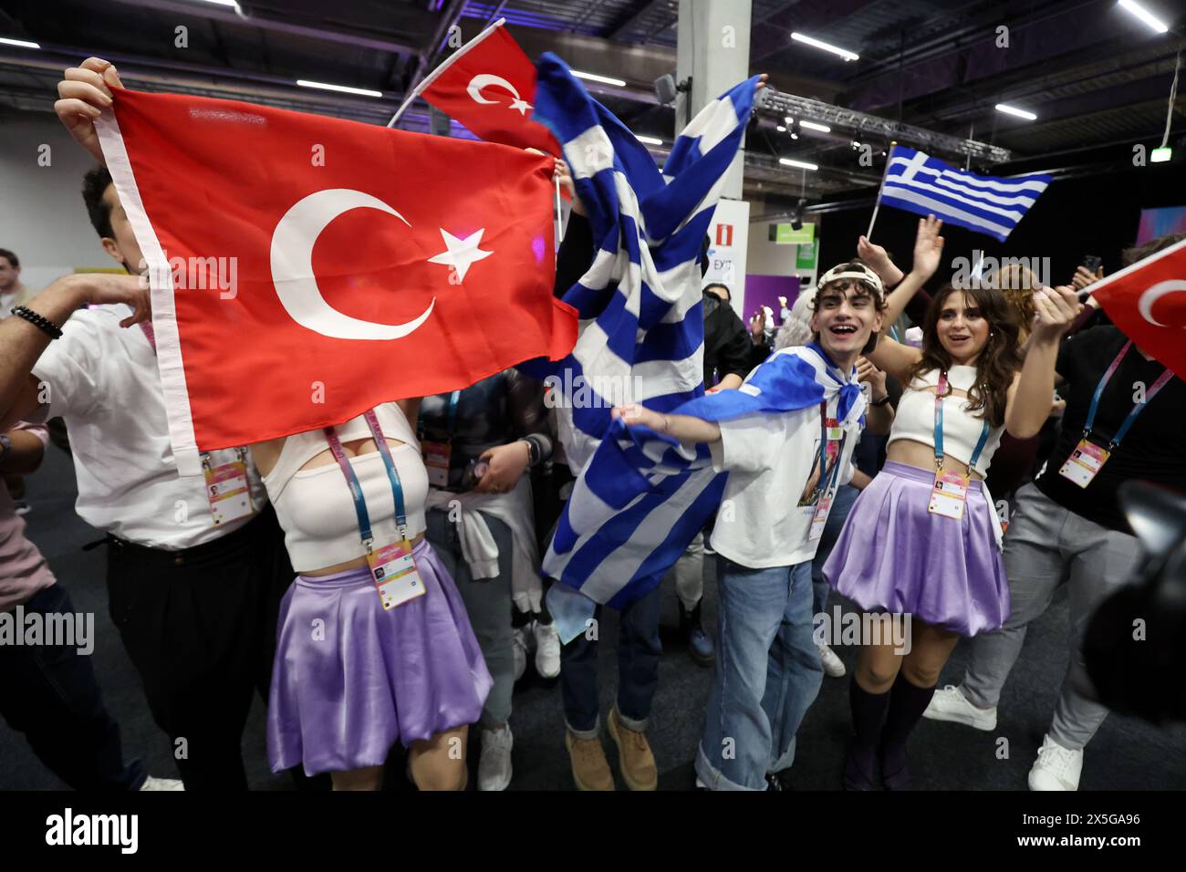 Malmo, Sweden. 09th May, 2024. People dance with Turkish and Greek flag ...