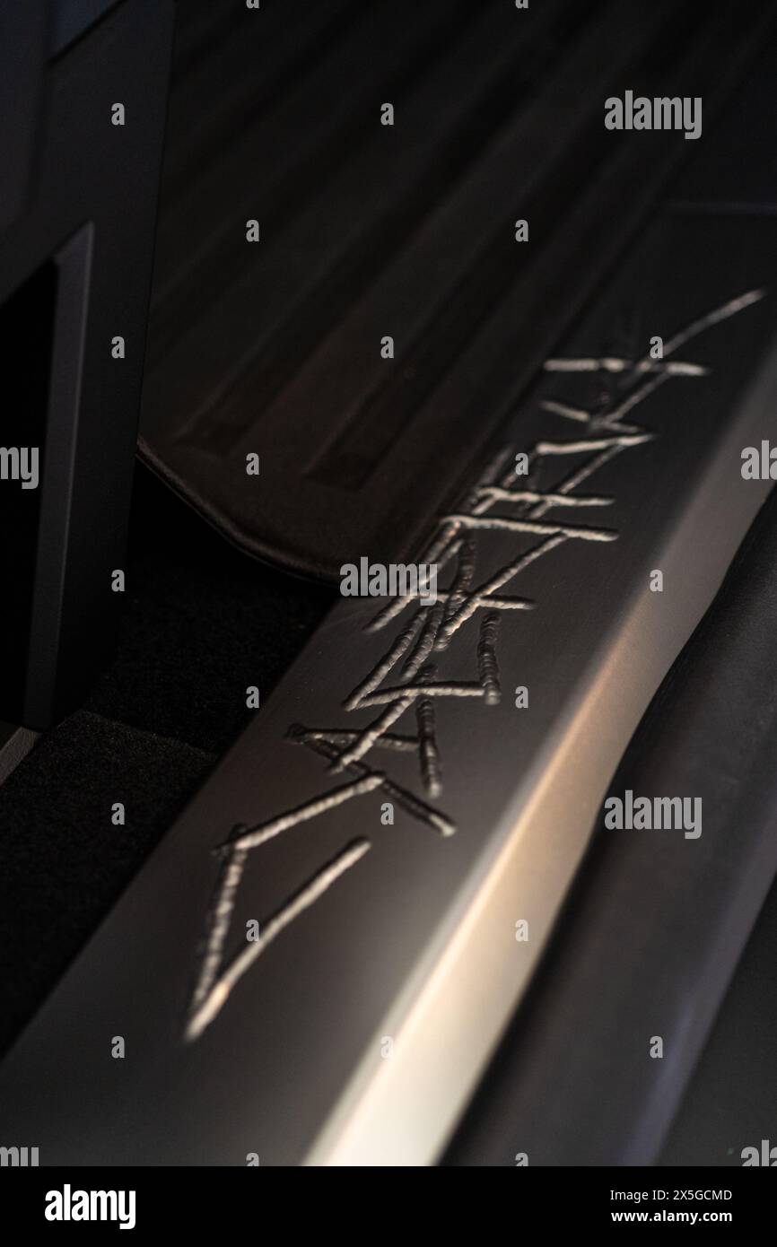 Close-Up of Tesla Cybertruck Signature Metal Engraving Stock Photo - Alamy