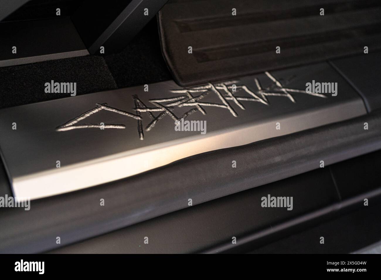 Close-Up of Tesla Cybertruck Signature Metal Engraving Stock Photo - Alamy