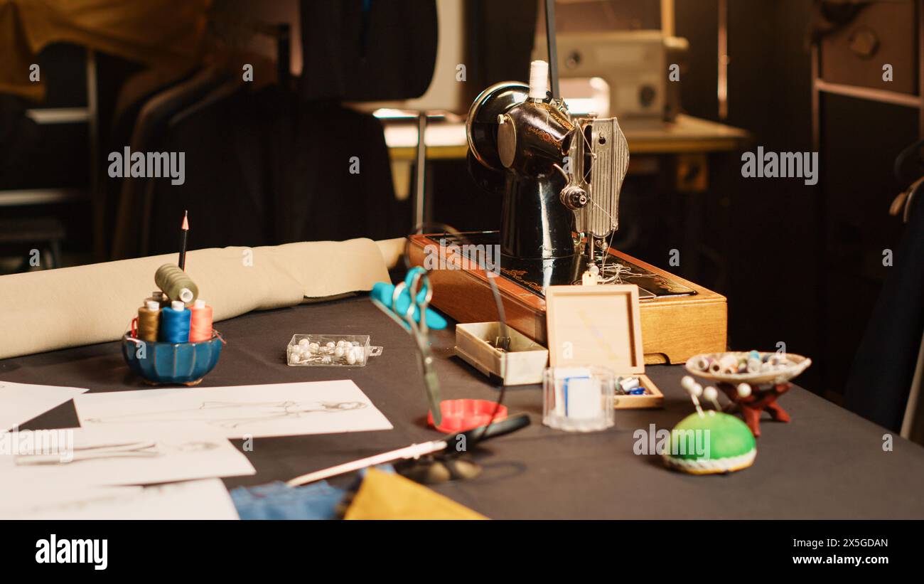 Industrial sewing machine and needles in fashion atelier, luxury craftsmanship with tailoring ...