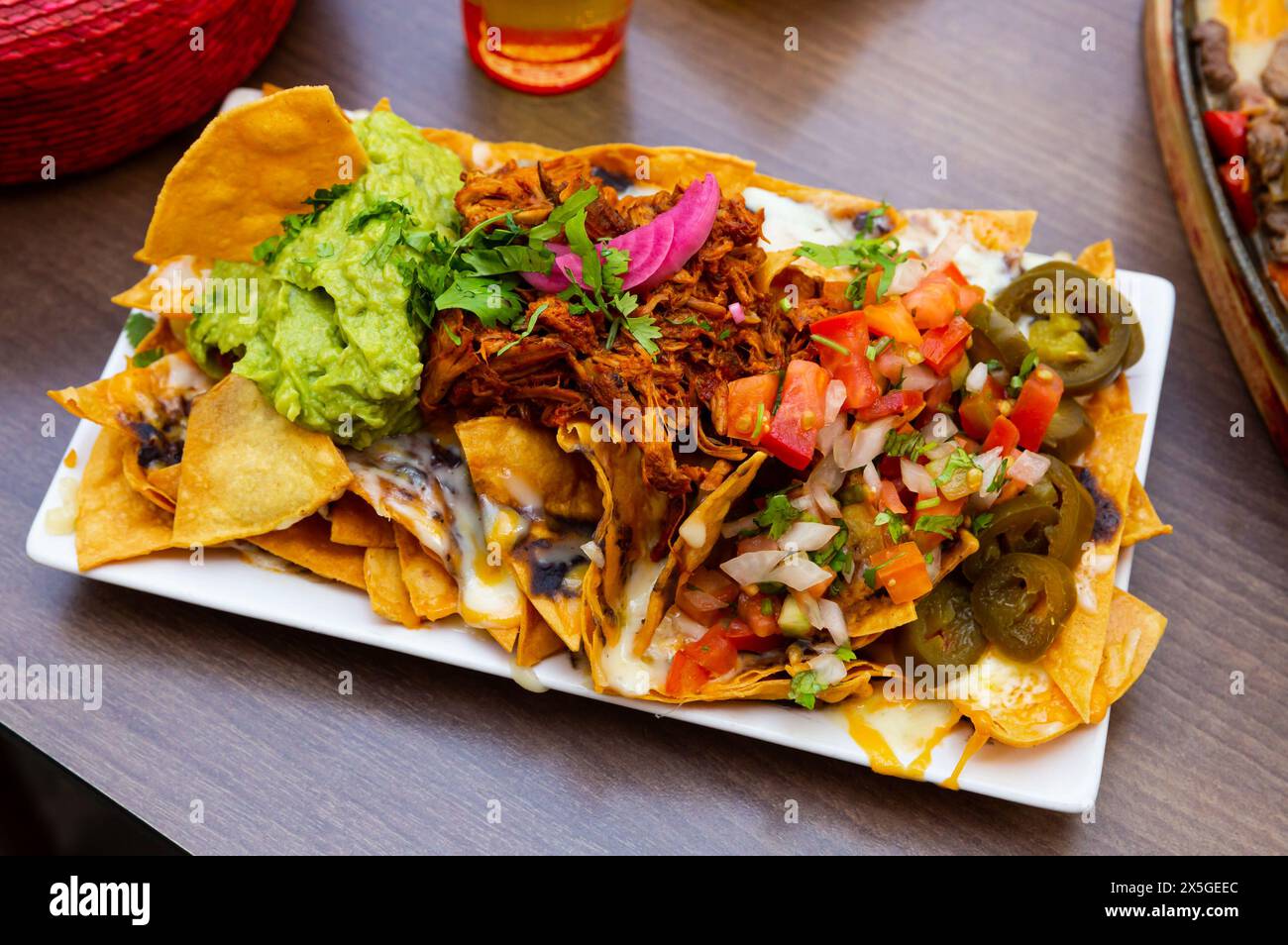 Traditional Mexican dish Nachos Stock Photo - Alamy