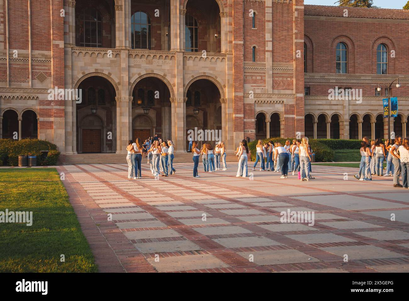 Group of People in Front of Stately Building, University Vibe Stock ...