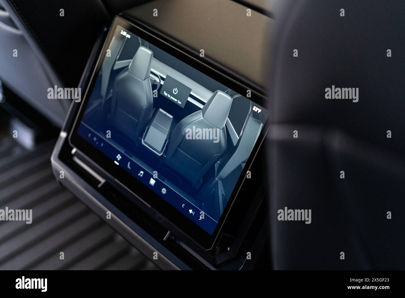 Advanced Rear Seat Screen Interface in Tesla Cybertruck Stock Photo - Alamy