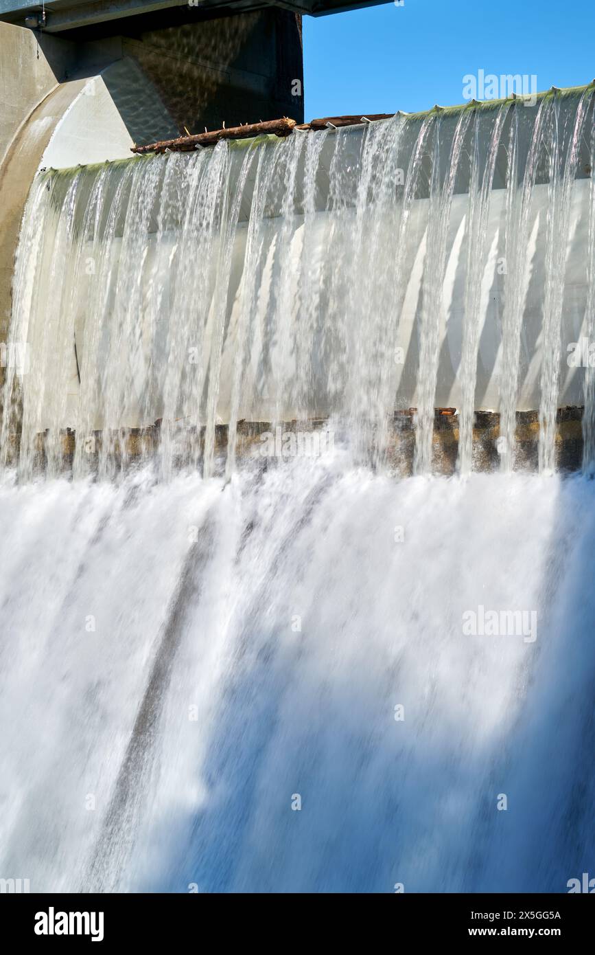 Dam Spillway Water Rushing vertical. A dam spillway as the water pours ...