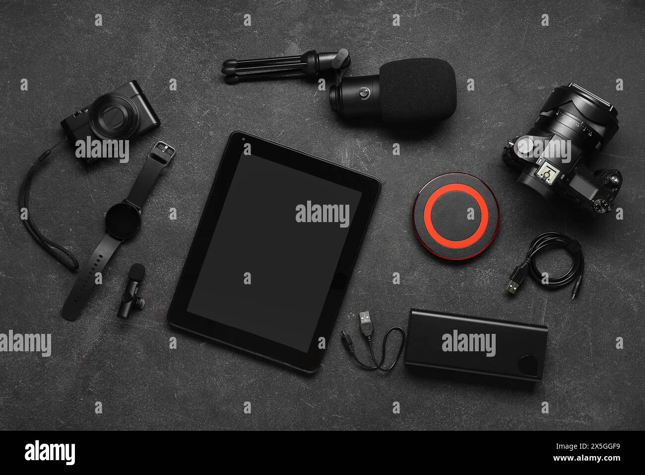 Set of different gadgets on dark background Stock Photo - Alamy