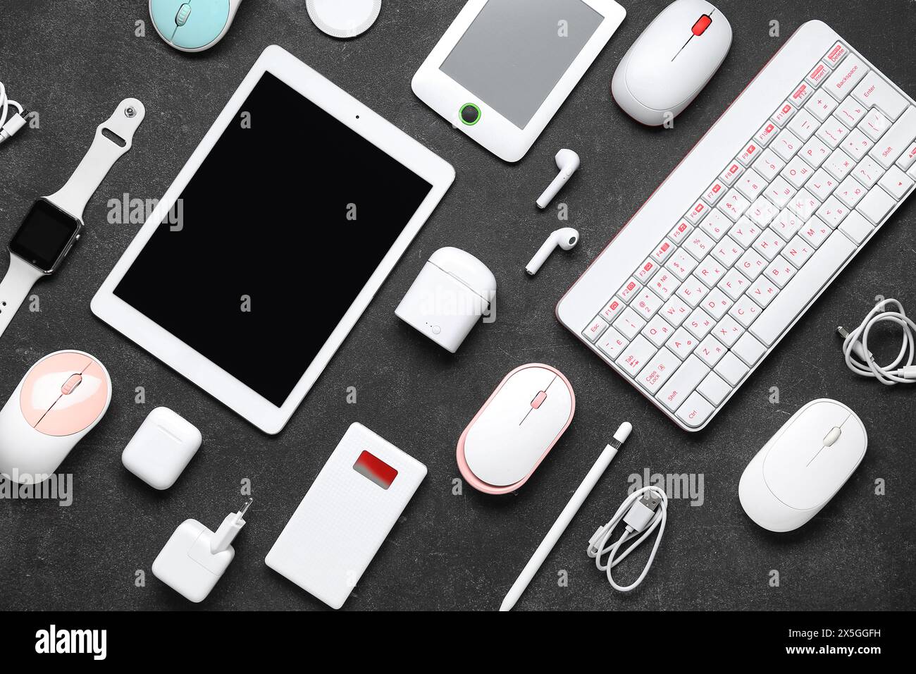 Composition with different modern devices on dark background Stock ...