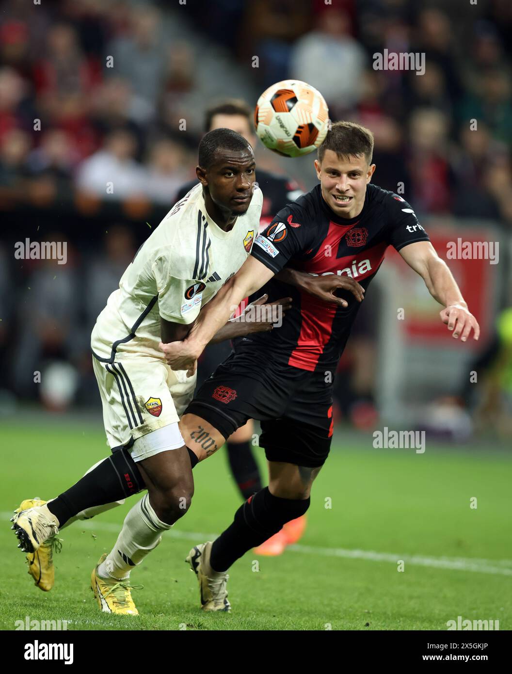 LEVERKUSEN, GERMANY - MAY 09: Adam Hlozek of Bayer Leverkusen vies with ...
