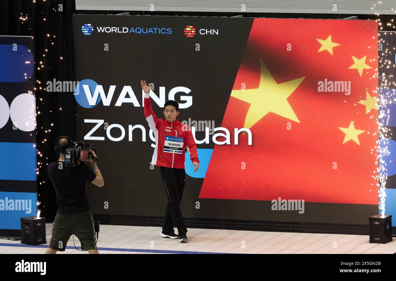 Berlin, Germany - March 24, 2024: Diver Zongyuan WANG of China greets the fans before the Men's ...