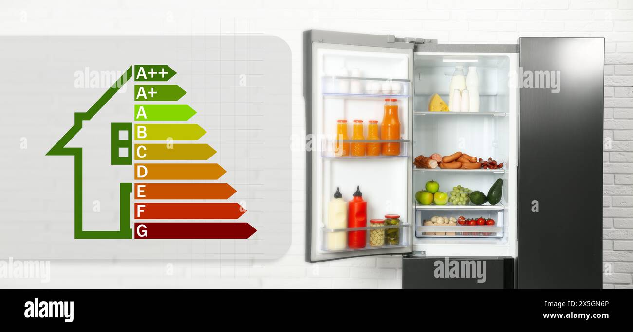 Energy efficiency rating label and open refrigerator indoors, banner ...
