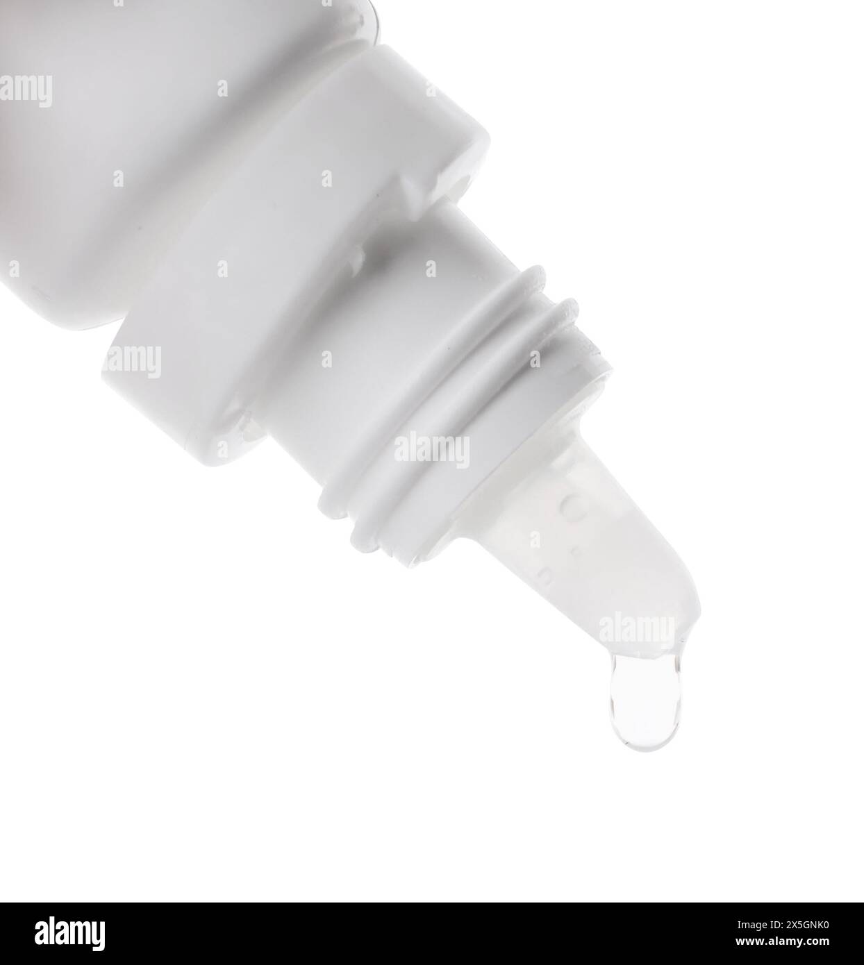 Dripping medical drops from bottle on white background Stock Photo - Alamy