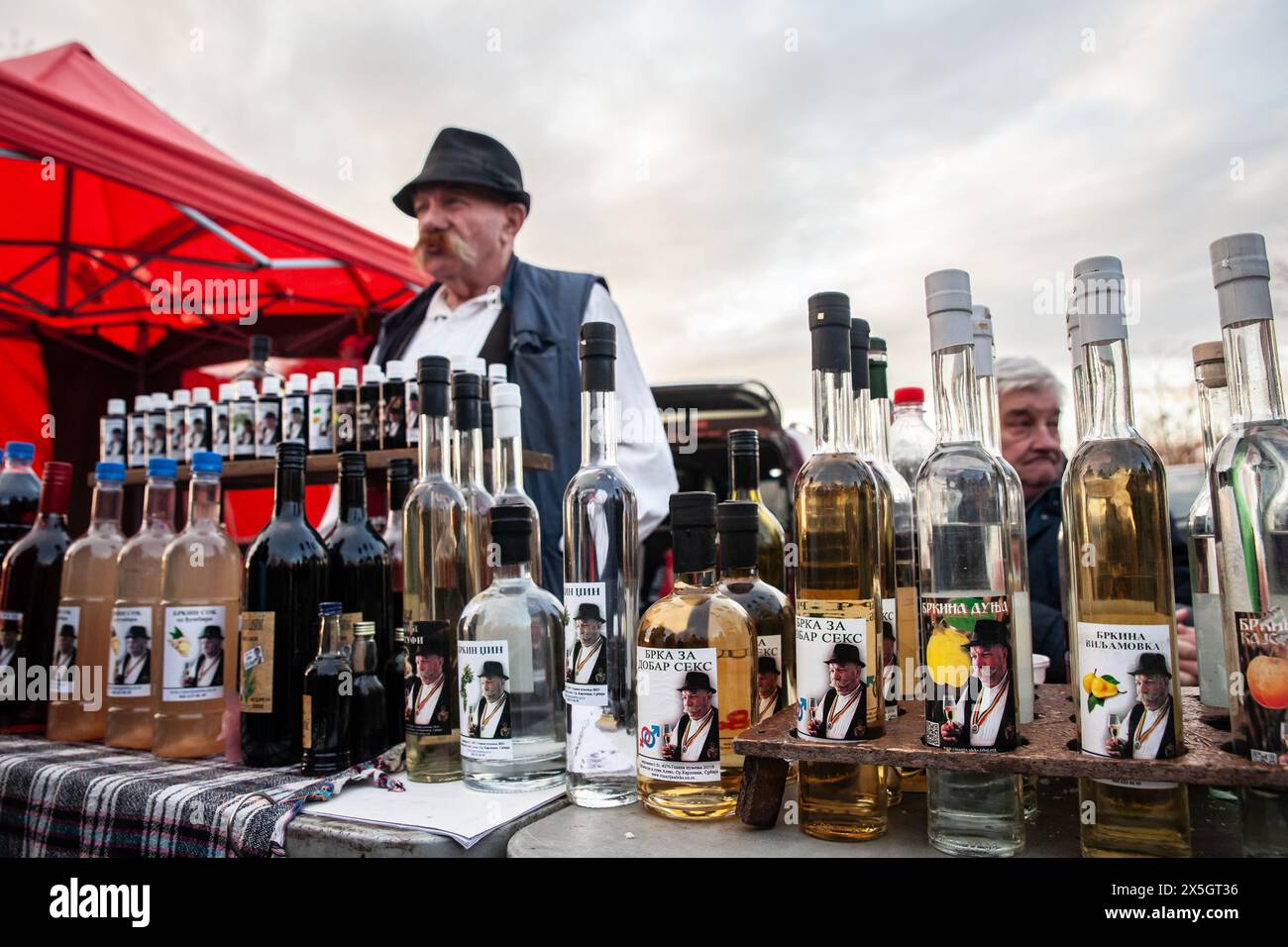 Picture of various rakijas displayed In Rumenka, in a market, in Serbia ...