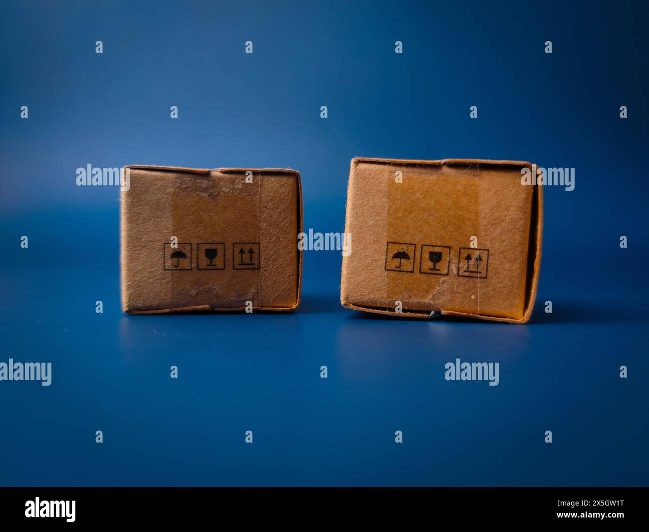 Closeup miniature mini express blind box on a blue background Stock ...