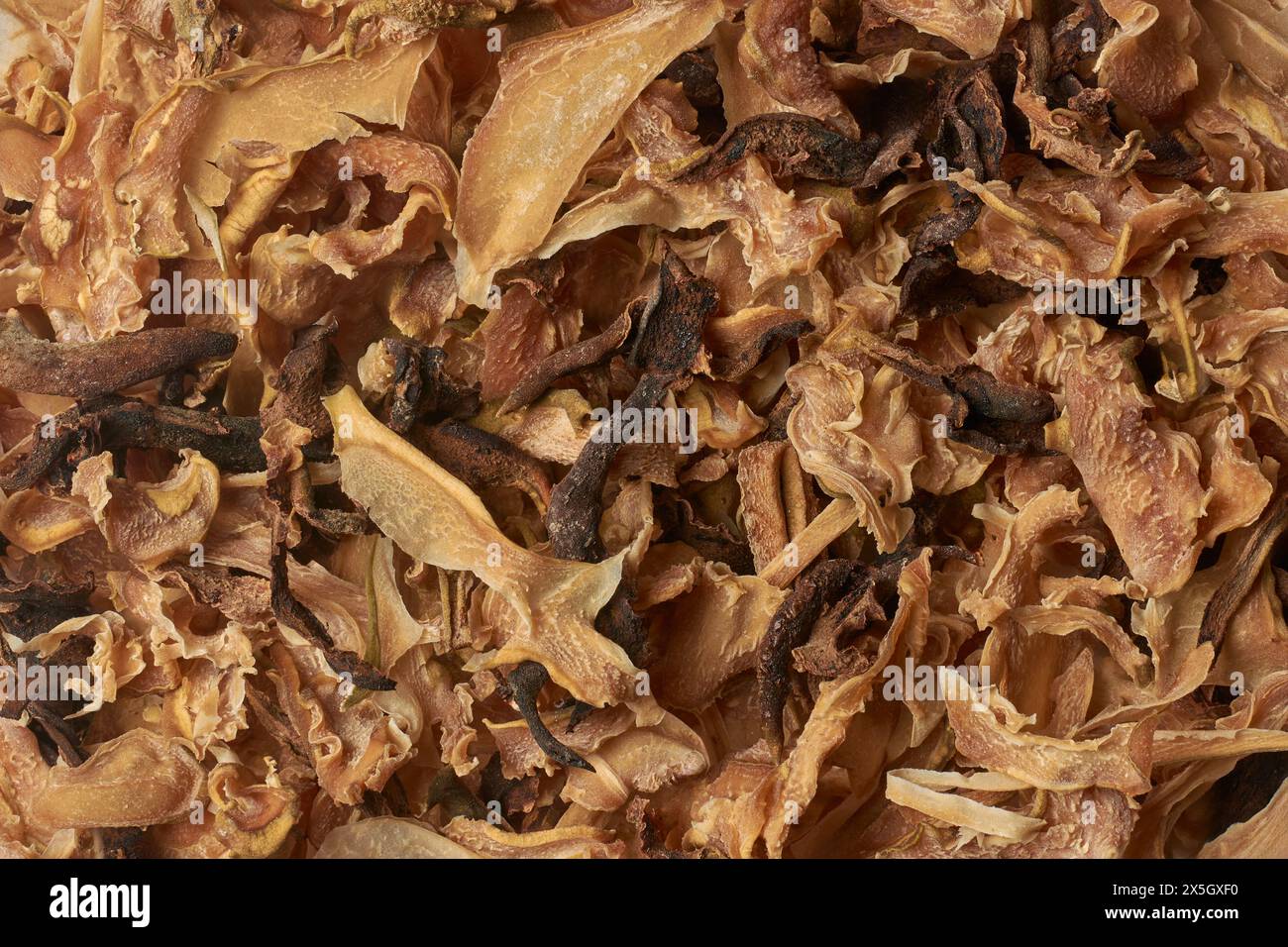 sun dried raw papaya slices or chunks, cut into pieces and dried using ...