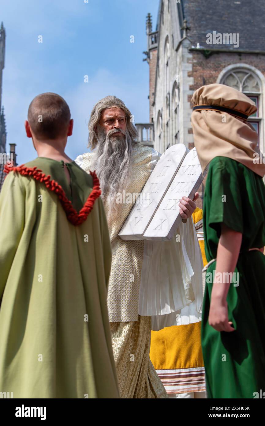 A man dressed as Mosses carries the ten commandments during the ...