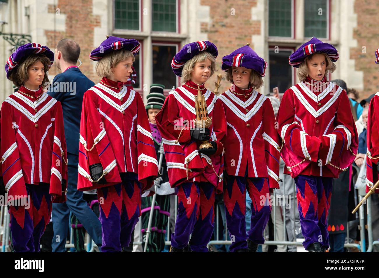 Young boys in medieval costumes take part during the Catholic festival ...