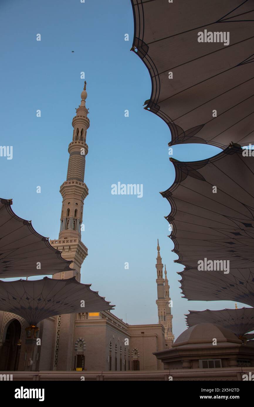 Prophet Mosque in Medina city. View of minarets between canopies Stock ...