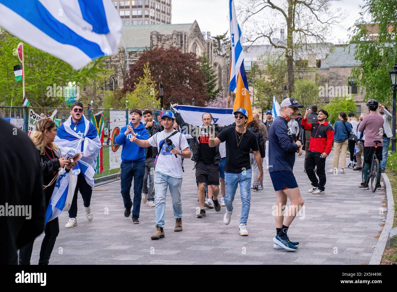 Pro-Israel supporters hold Israeli flags during the demonstration. Pro ...