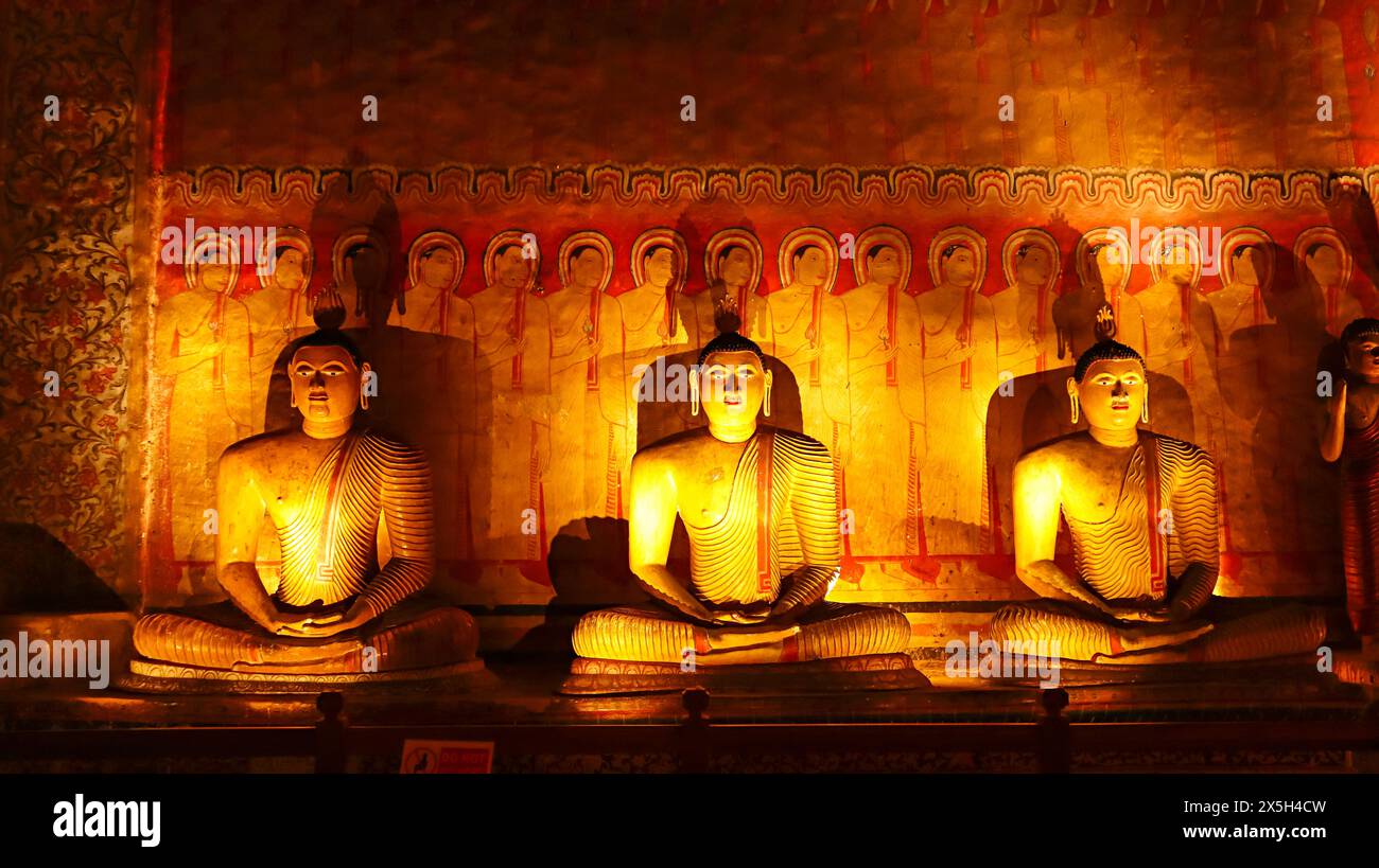Statues of Lord Buddha and Disciples Painting Behind, Cave Temple ...