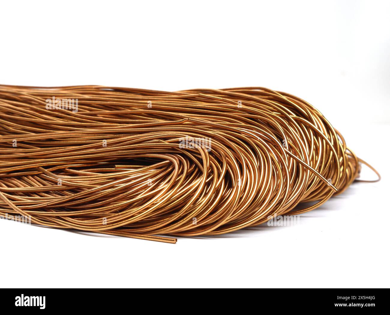 copper bullion wire isolated on white background Stock Photo - Alamy