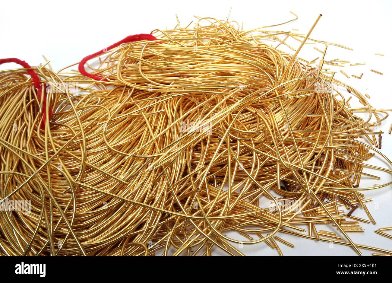 golden bullion wire isolated on white background Stock Photo - Alamy
