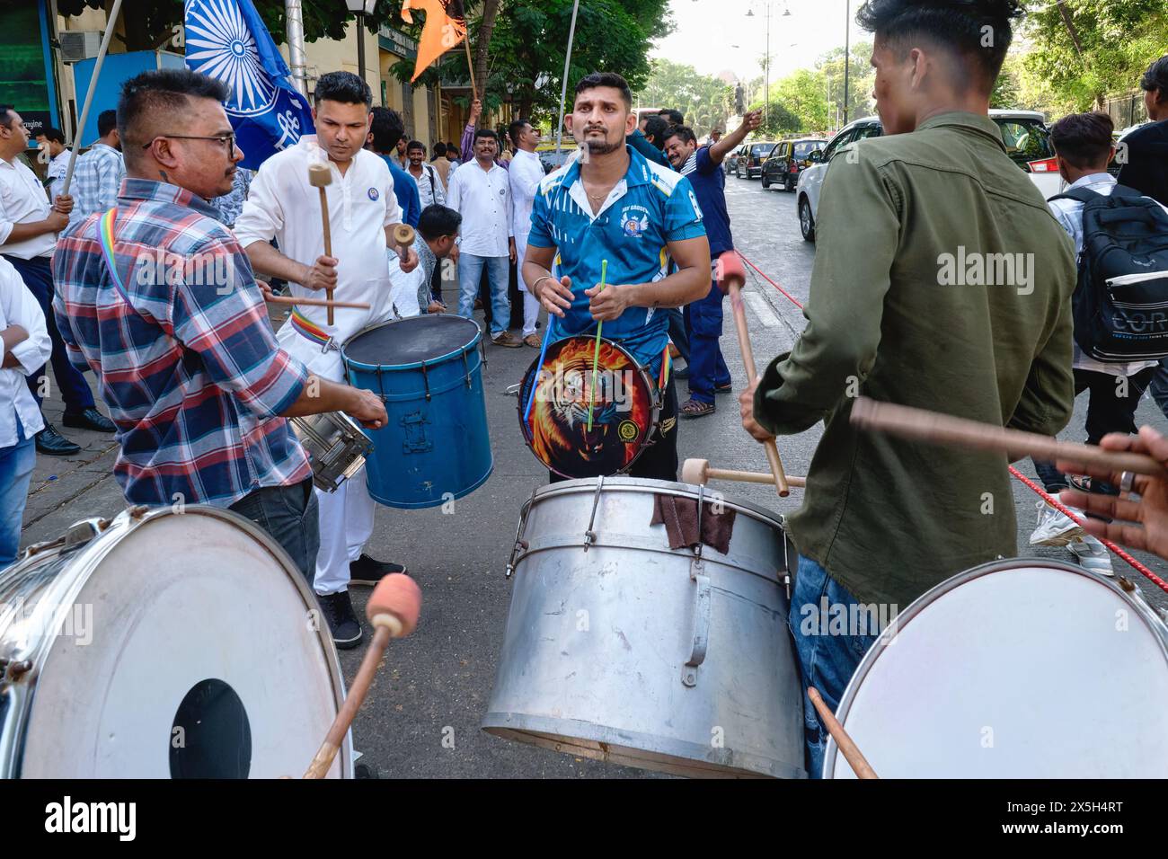 Drummers in Mumbai, India, beating a frantic rhythm during Ambedkar ...