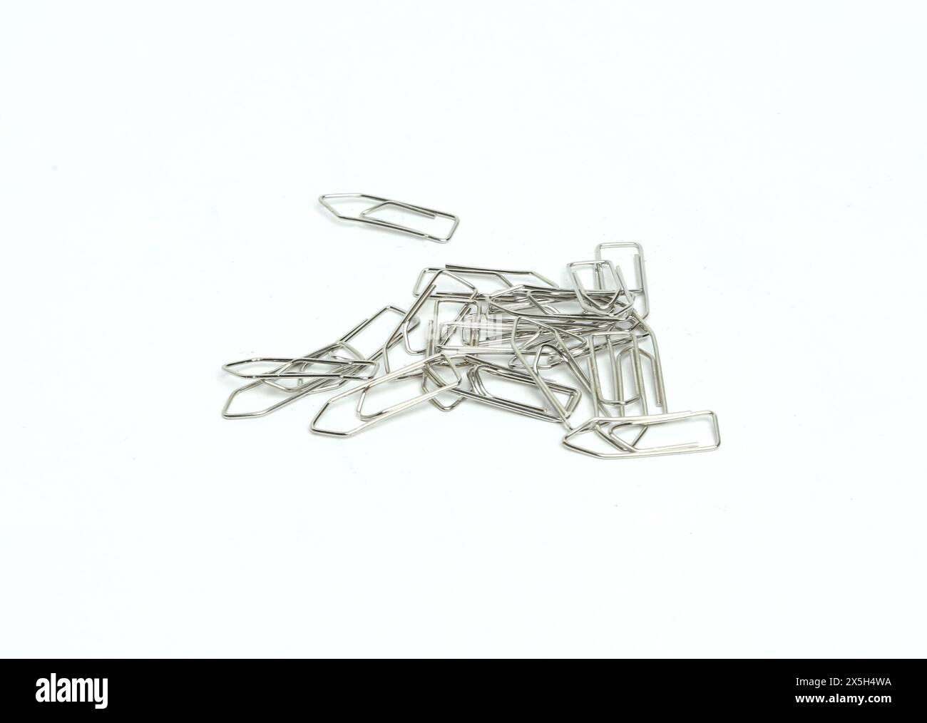 paper clamp-pin isolated on white background Stock Photo - Alamy