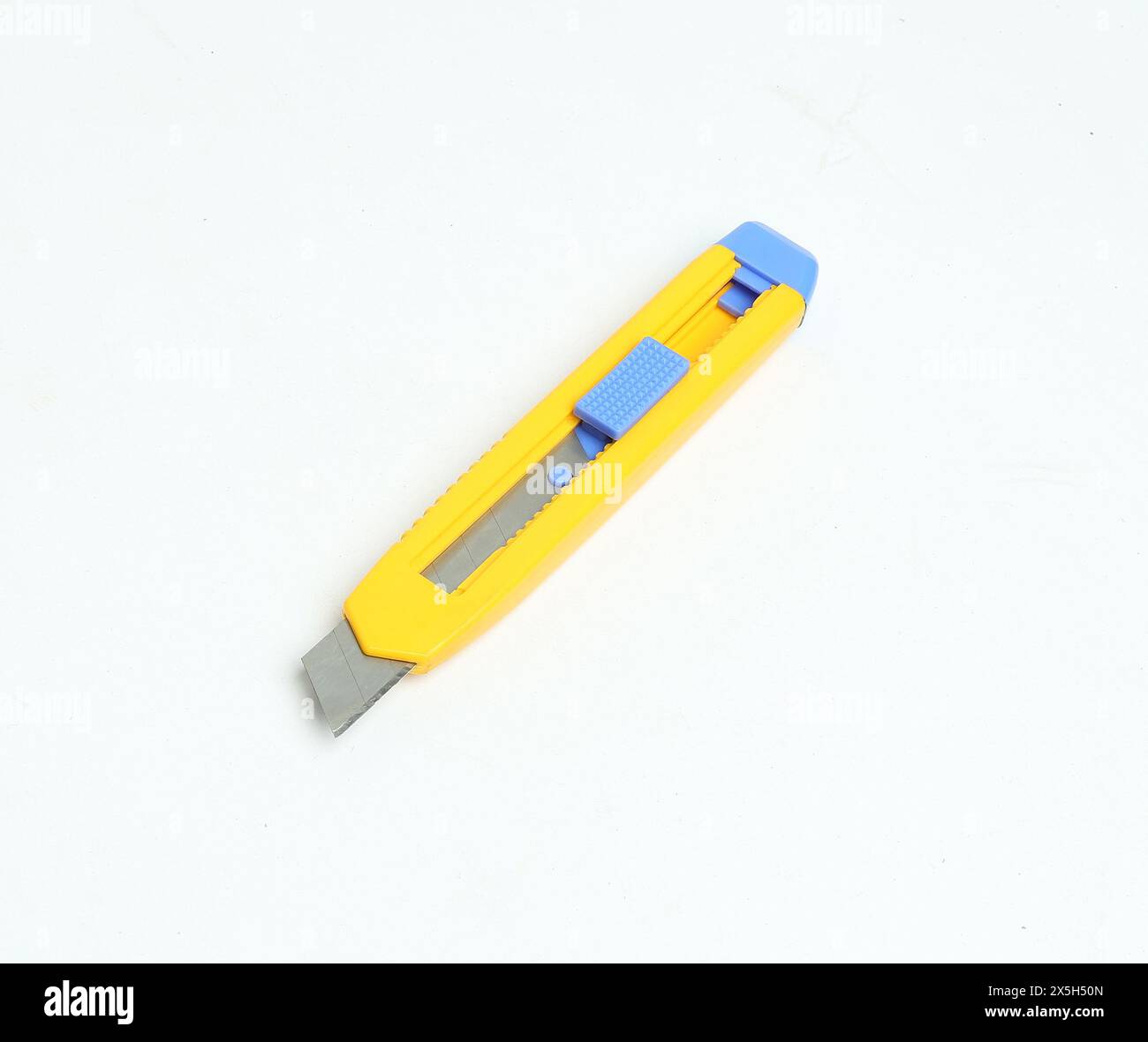 paper cutter with blade isolated on white background Stock Photo - Alamy