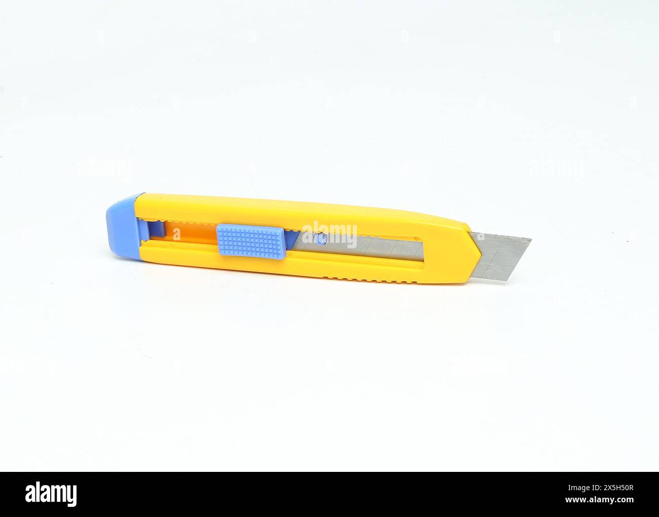 paper cutter with blade isolated on white background Stock Photo - Alamy
